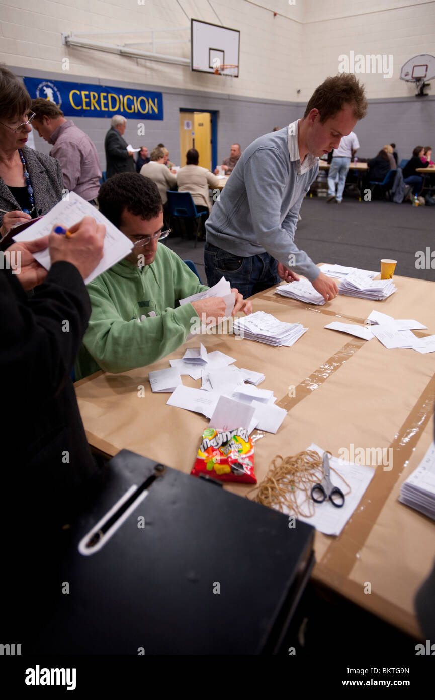 Tellers observing and monitoring the counting of votes cast in the ...