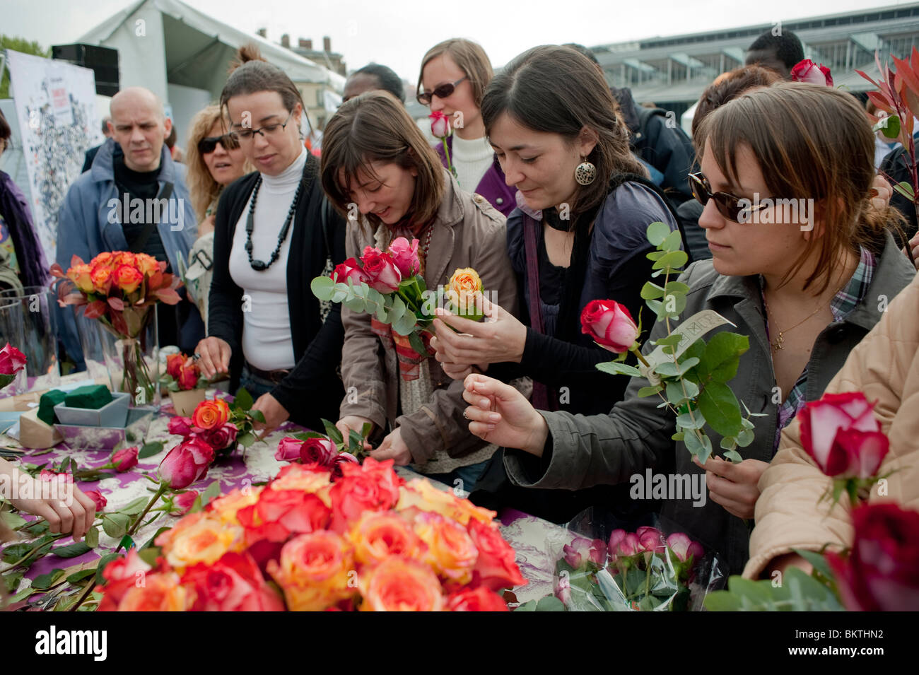 Crowd of People Taking Roses at Florist Stall at Celebration of World ...