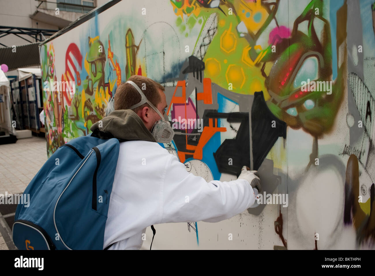 Man Spray Painting Wall Mural, Graffiti at "Parc de la Villette" Paris ...