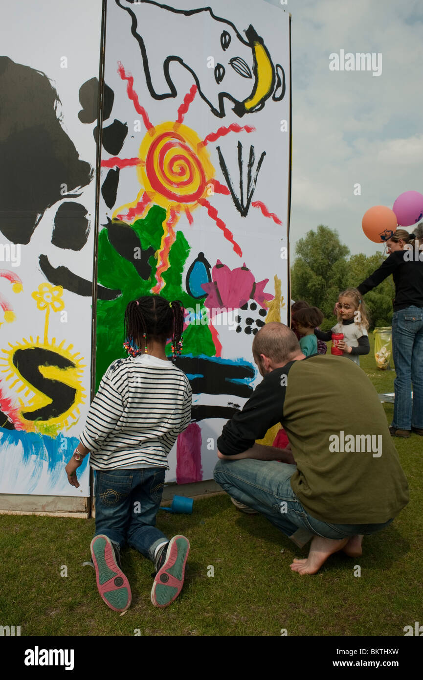 Families at Celebration of World "Fair Trade" Day, with people Painting ...
