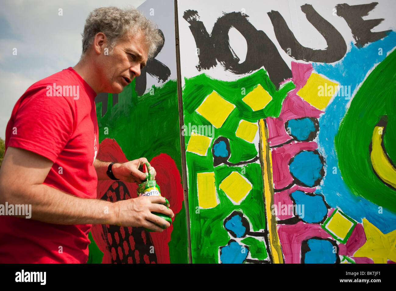 Celebration of World "Fair Trade" Day, with Man Painting Wall Mural in ...