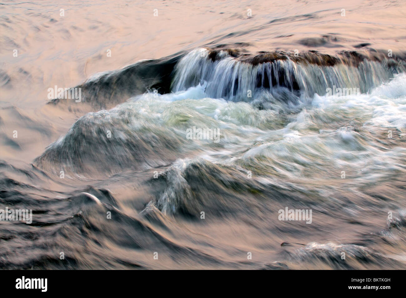 Water flowing over rocks taken with a slow shutter speed Stock Photo ...