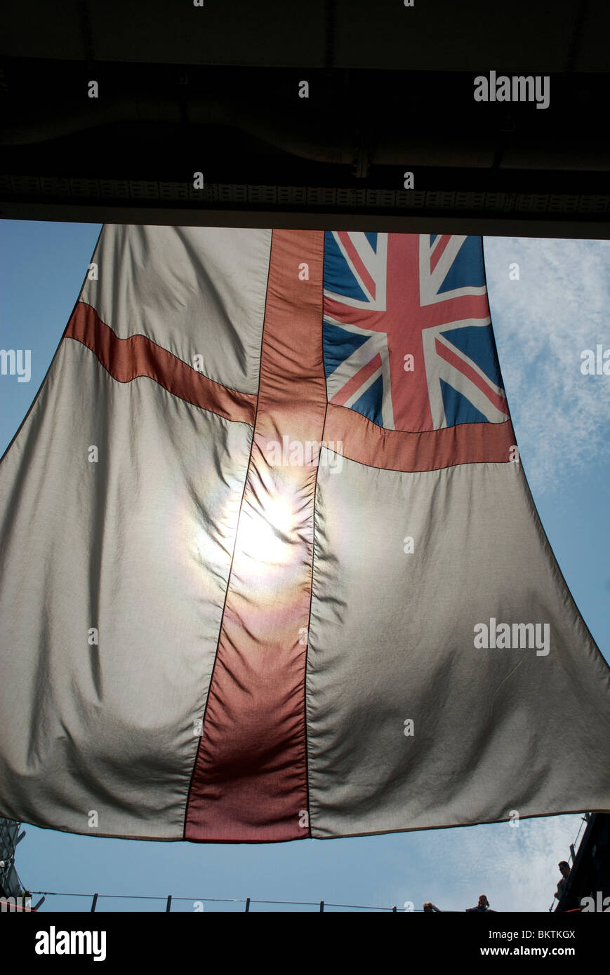 Large ship's flag viewed from below decks of the Aircraft Carrier HMS ...