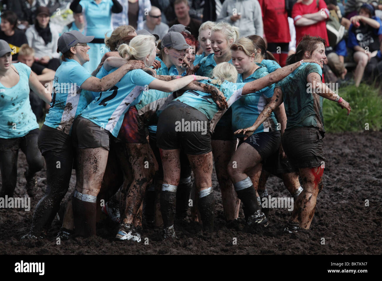 SWAMP SOCCER, EXTREME SPORT: Women celebrate a win at the 13th Annual ...