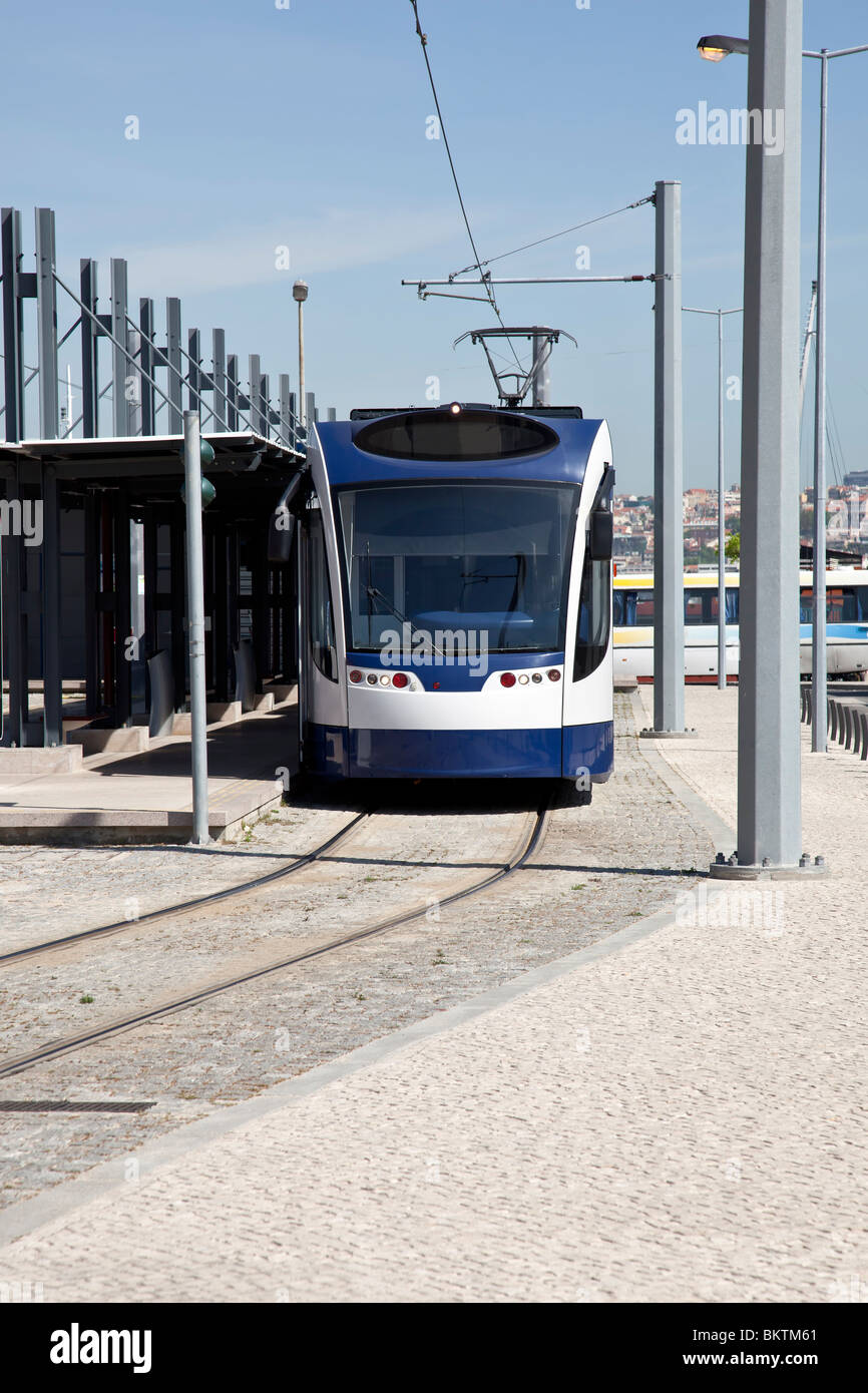 Modern tram parked at the metro station Stock Photo - Alamy
