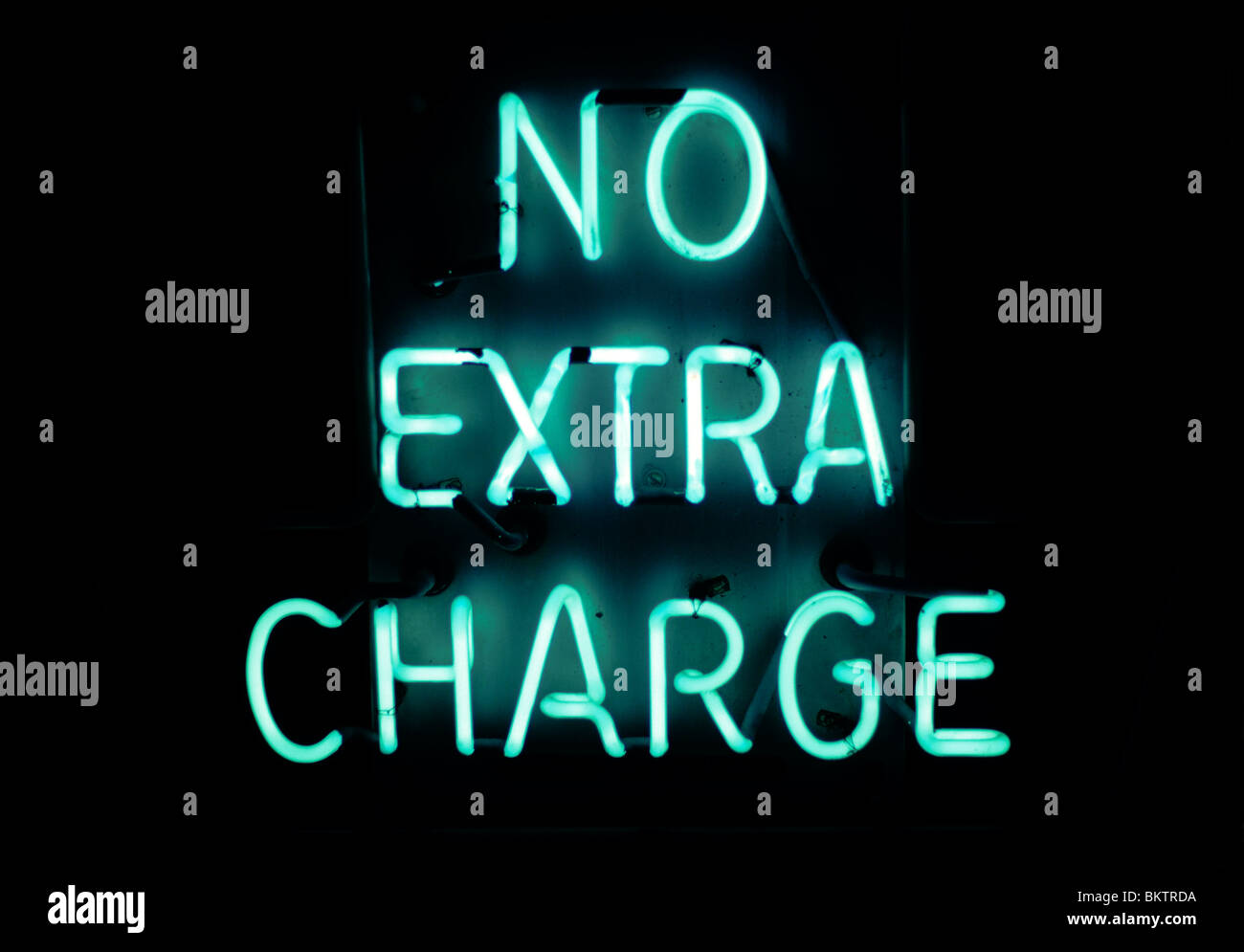 No Extra Charge "old fashioned" neon sign in the window of a dry ...