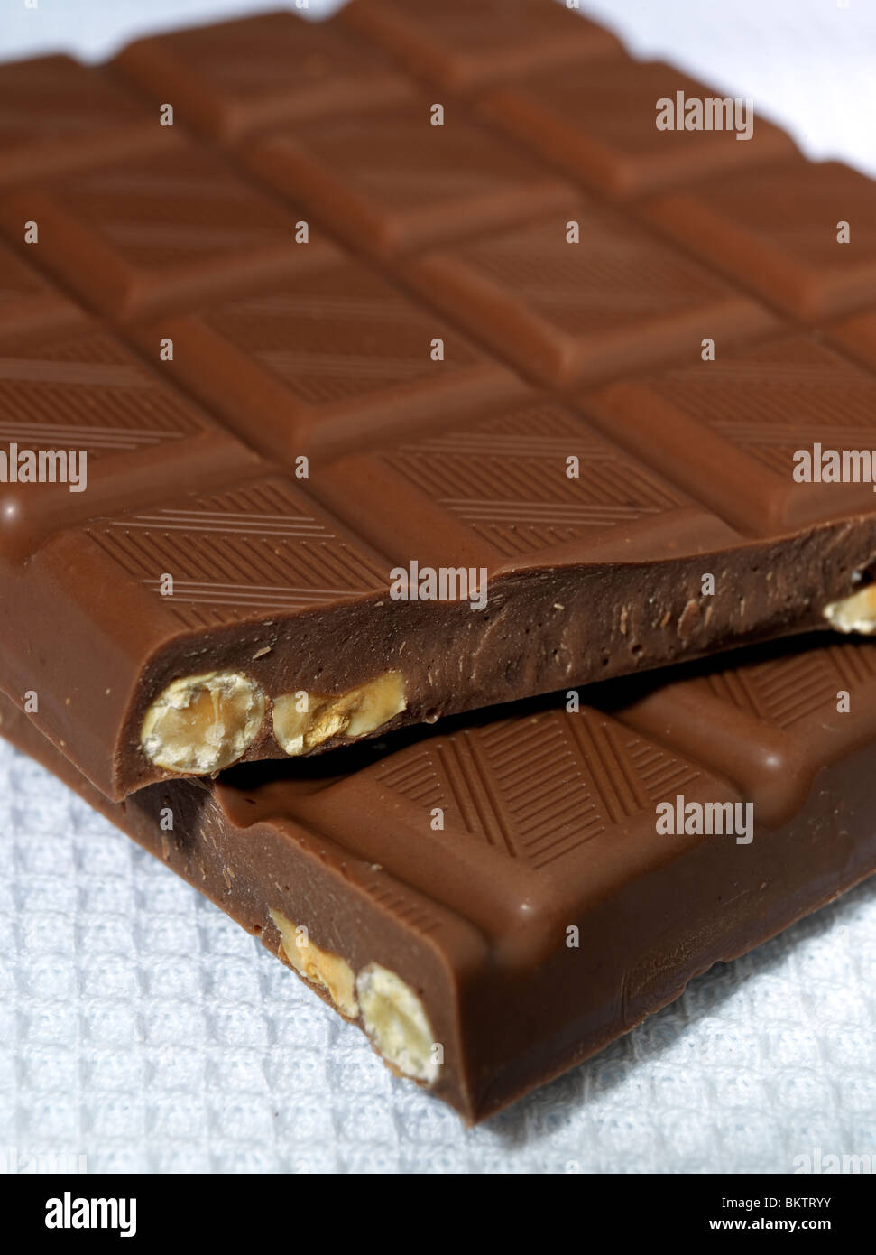 Extra fine swiss chocolate with hazelnuts Stock Photo - Alamy