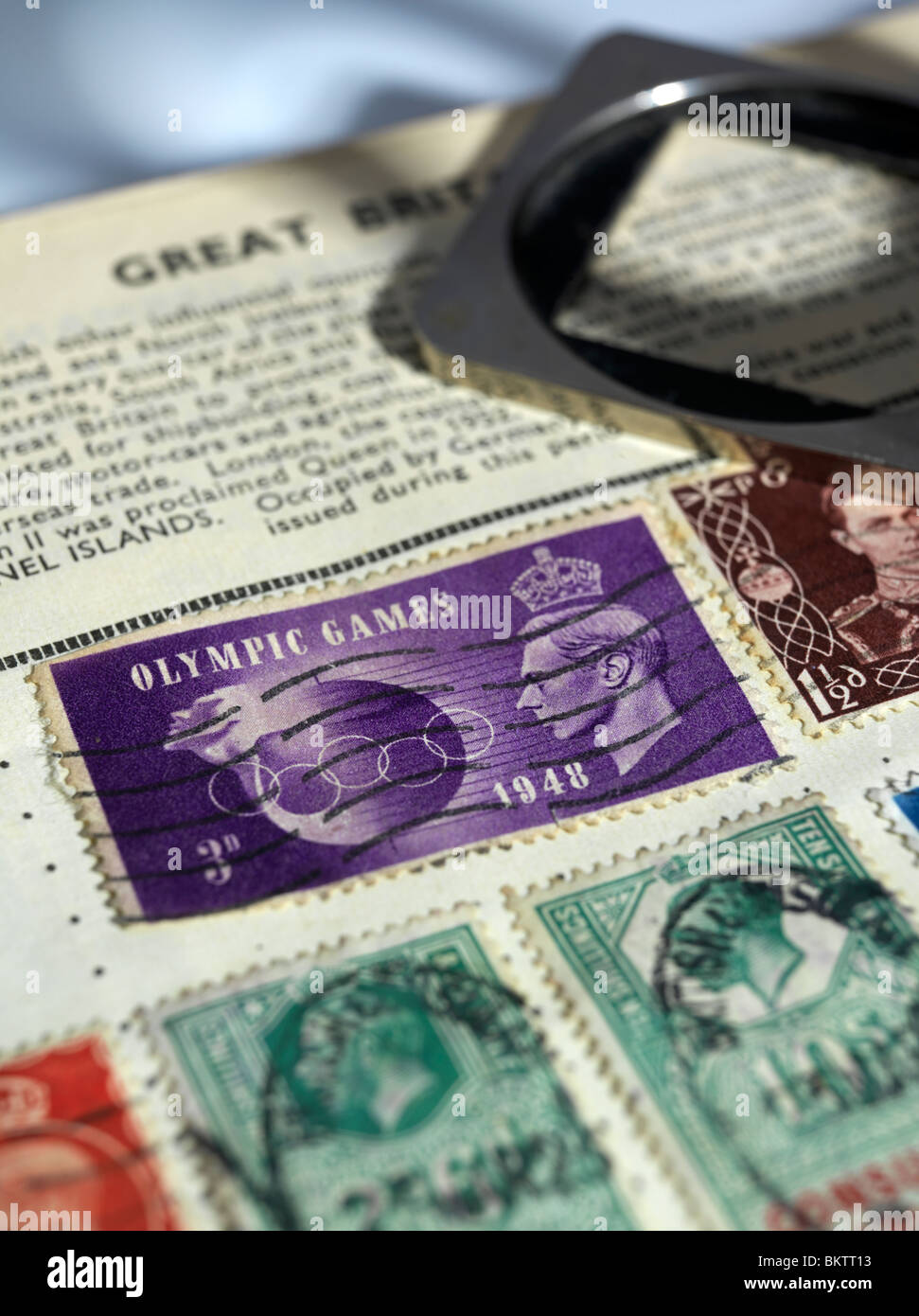 Stamp celebrating the 1948 London Olympics in old album Stock Photo - Alamy