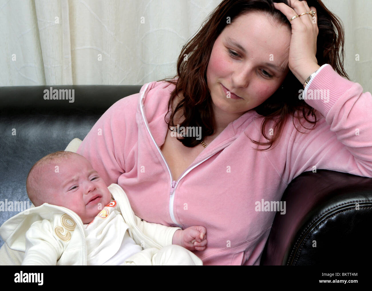 Crying young baby sit hi-res stock photography and images - Alamy