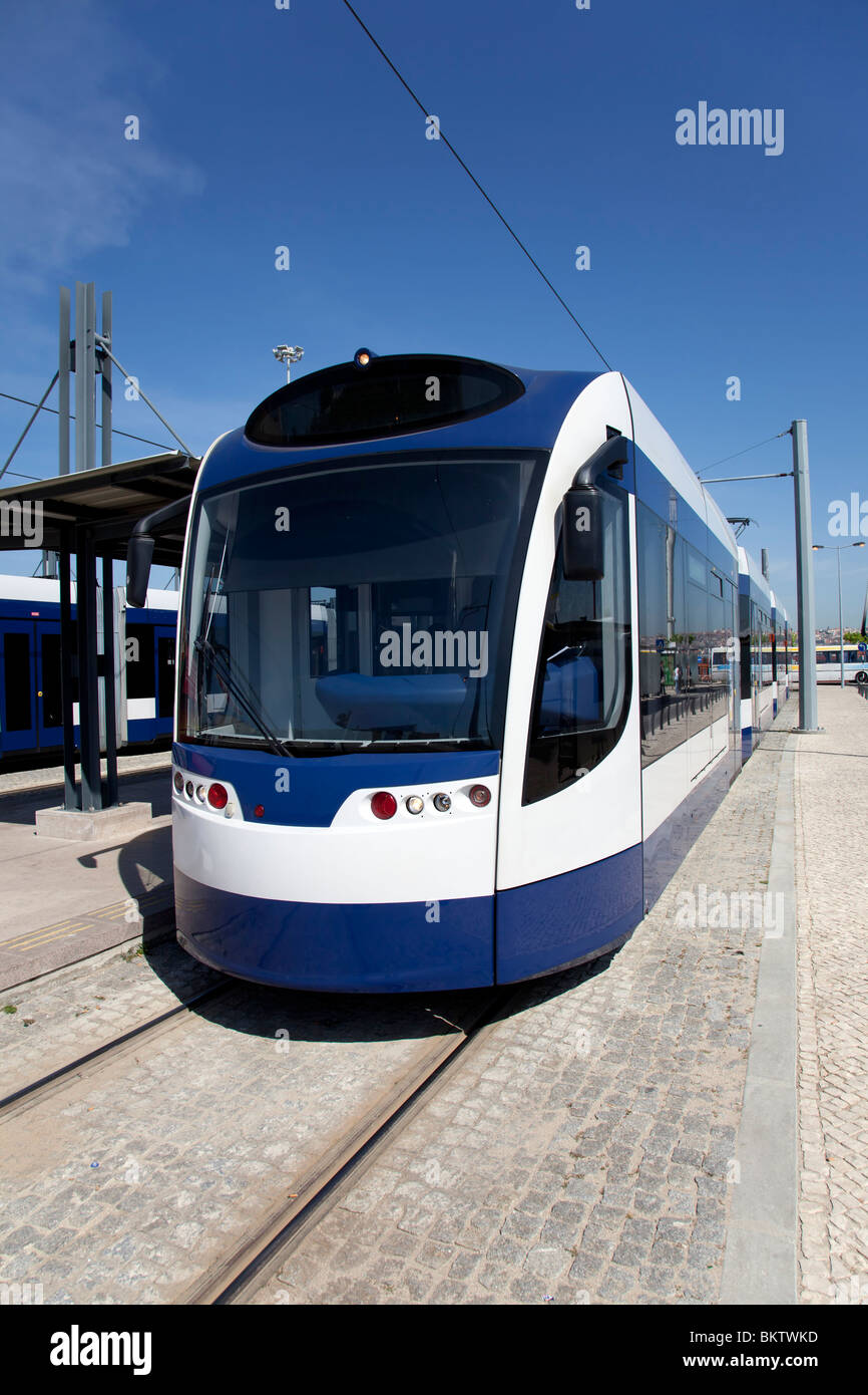Modern tram parked at the metro station Stock Photo - Alamy