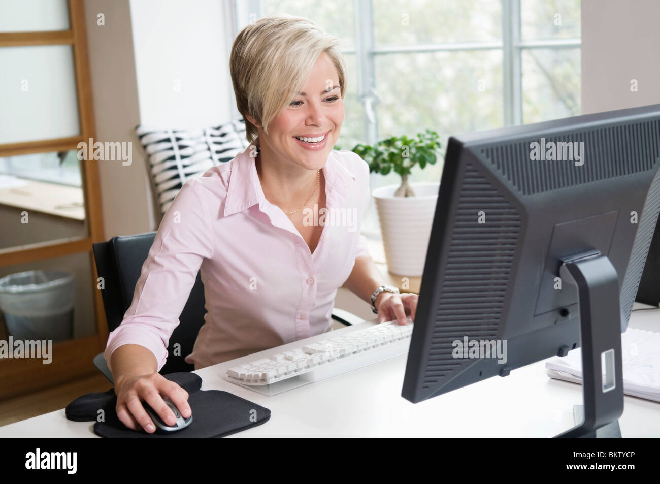 Woman at work Stock Photo - Alamy