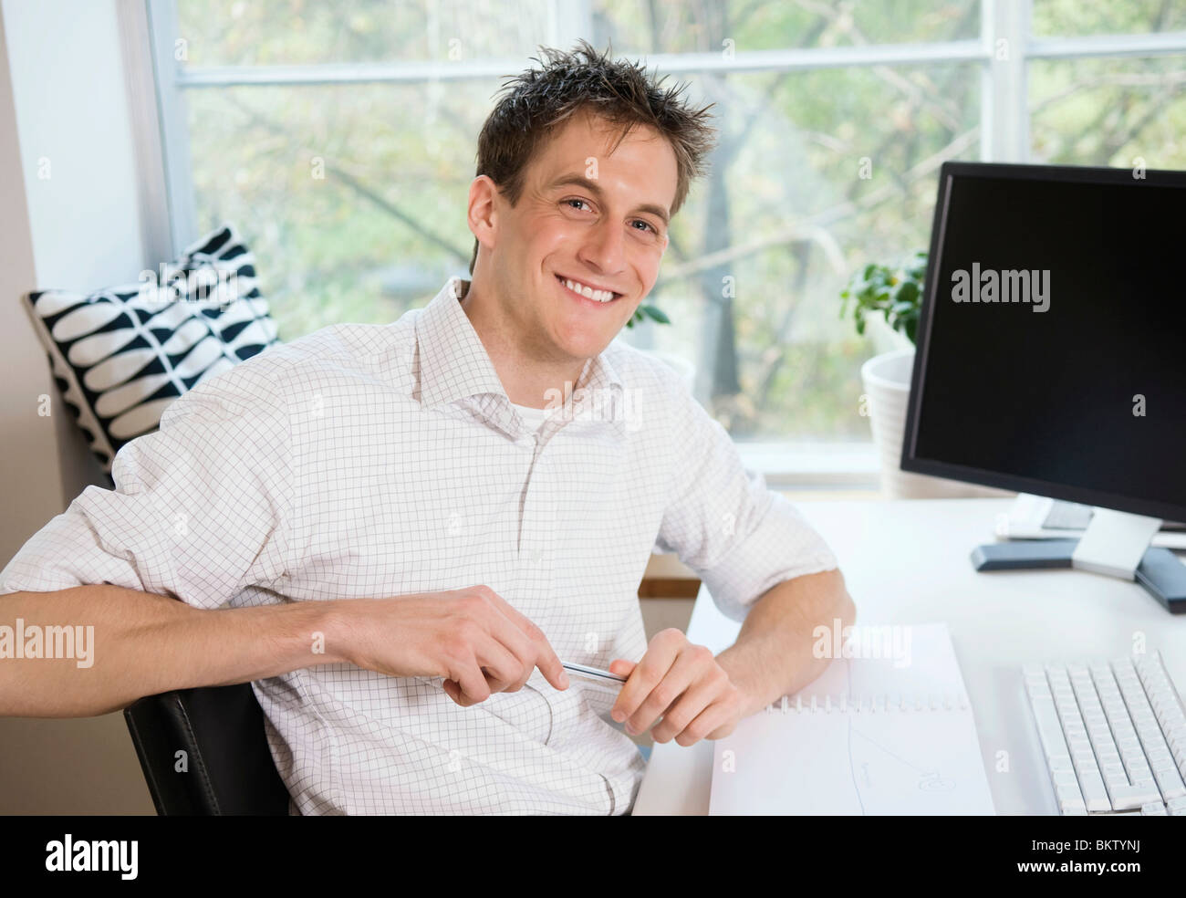 Happy man at work Stock Photo - Alamy
