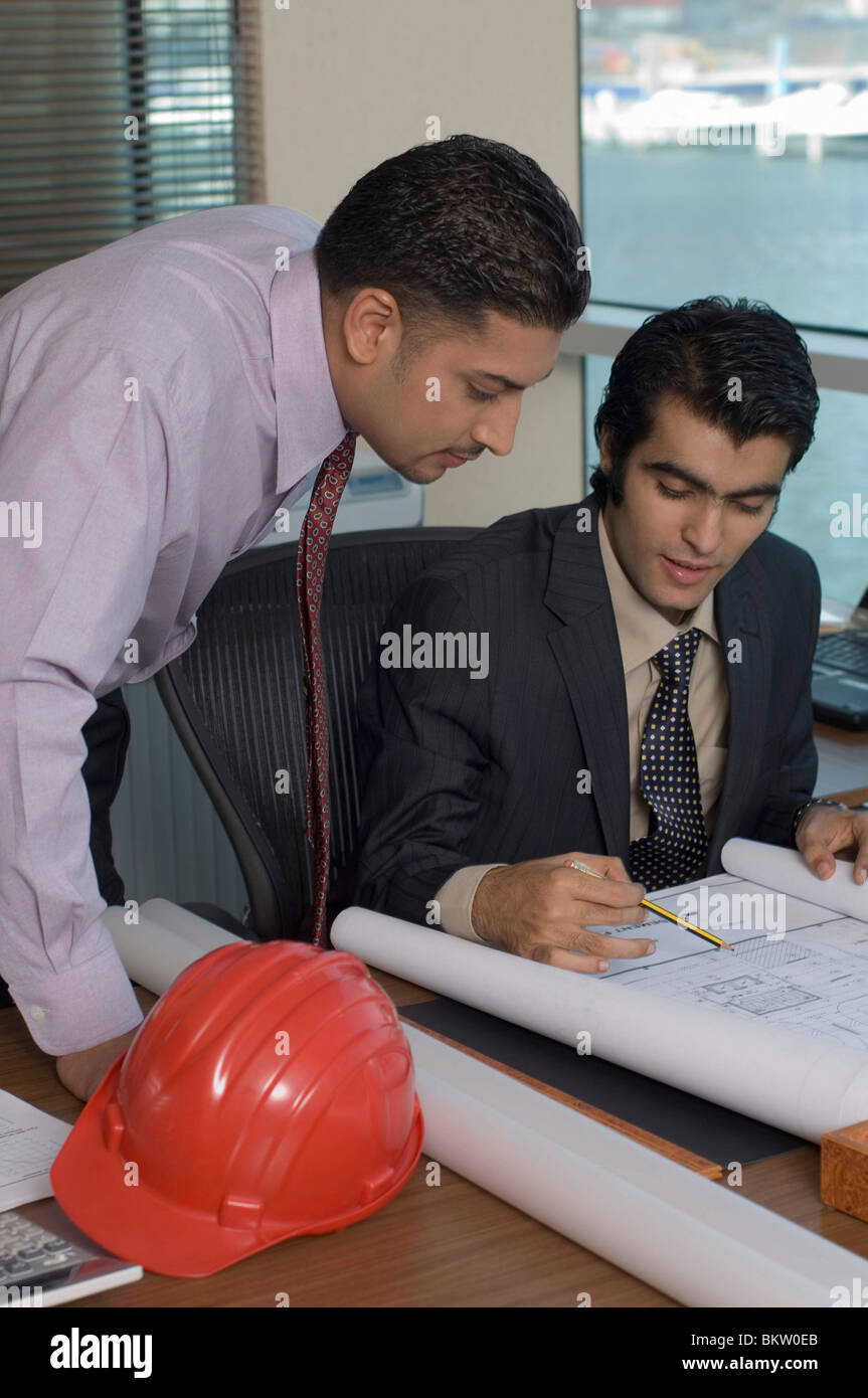 Businessmen planning in office Stock Photo - Alamy