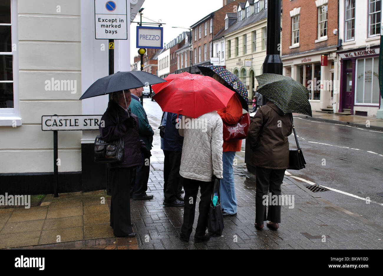 People carrying umbrellas Stock Photo - Alamy