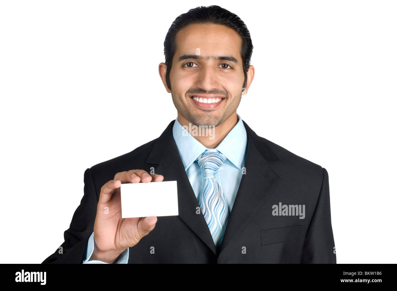 Businessman showing card, smiling Stock Photo - Alamy