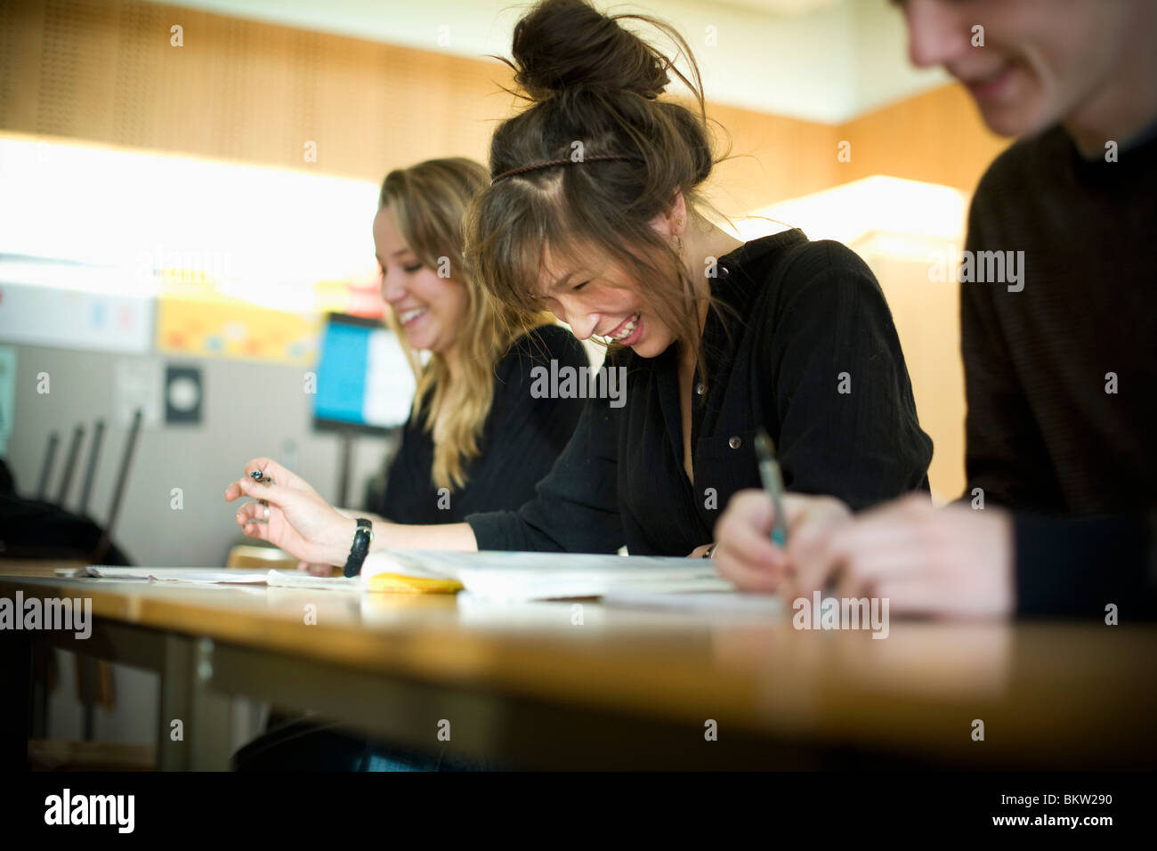 Three happy students Stock Photo - Alamy