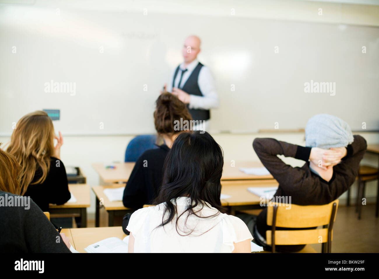 Teacher teaching class Stock Photo - Alamy