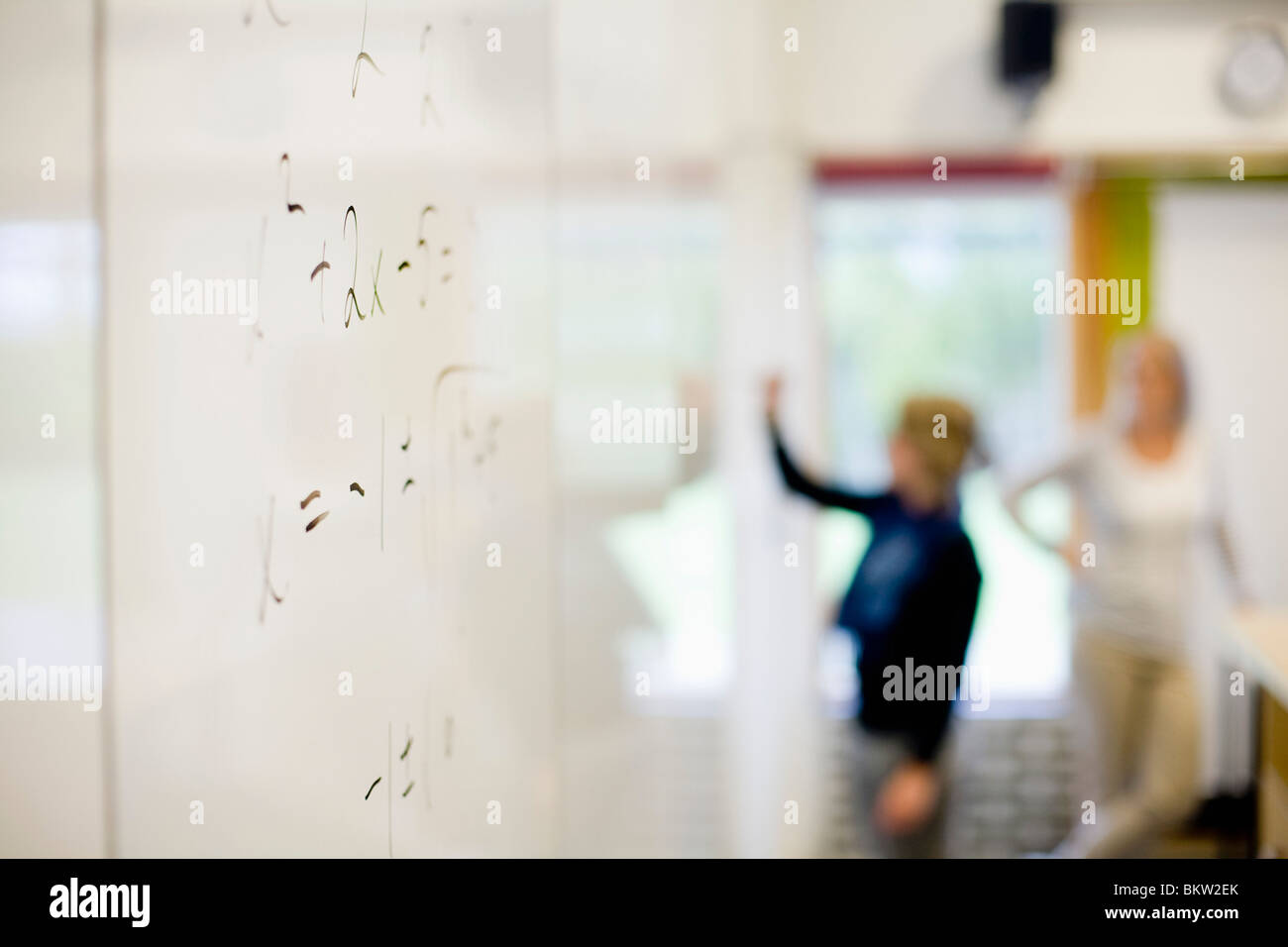 Teenager writing girl whiteboard hi-res stock photography and images ...
