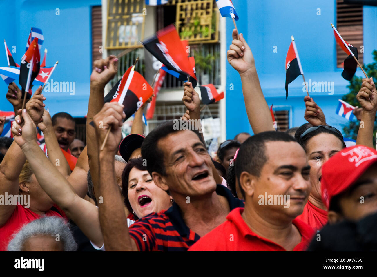 Cuban workers waving the flags during the annual celebration of the ...