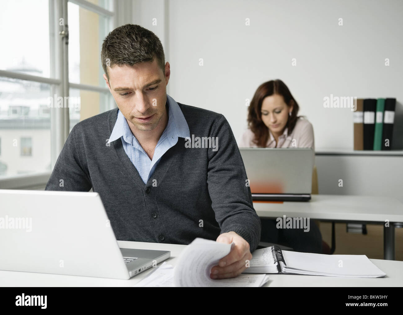 Two coworkers at office Stock Photo - Alamy