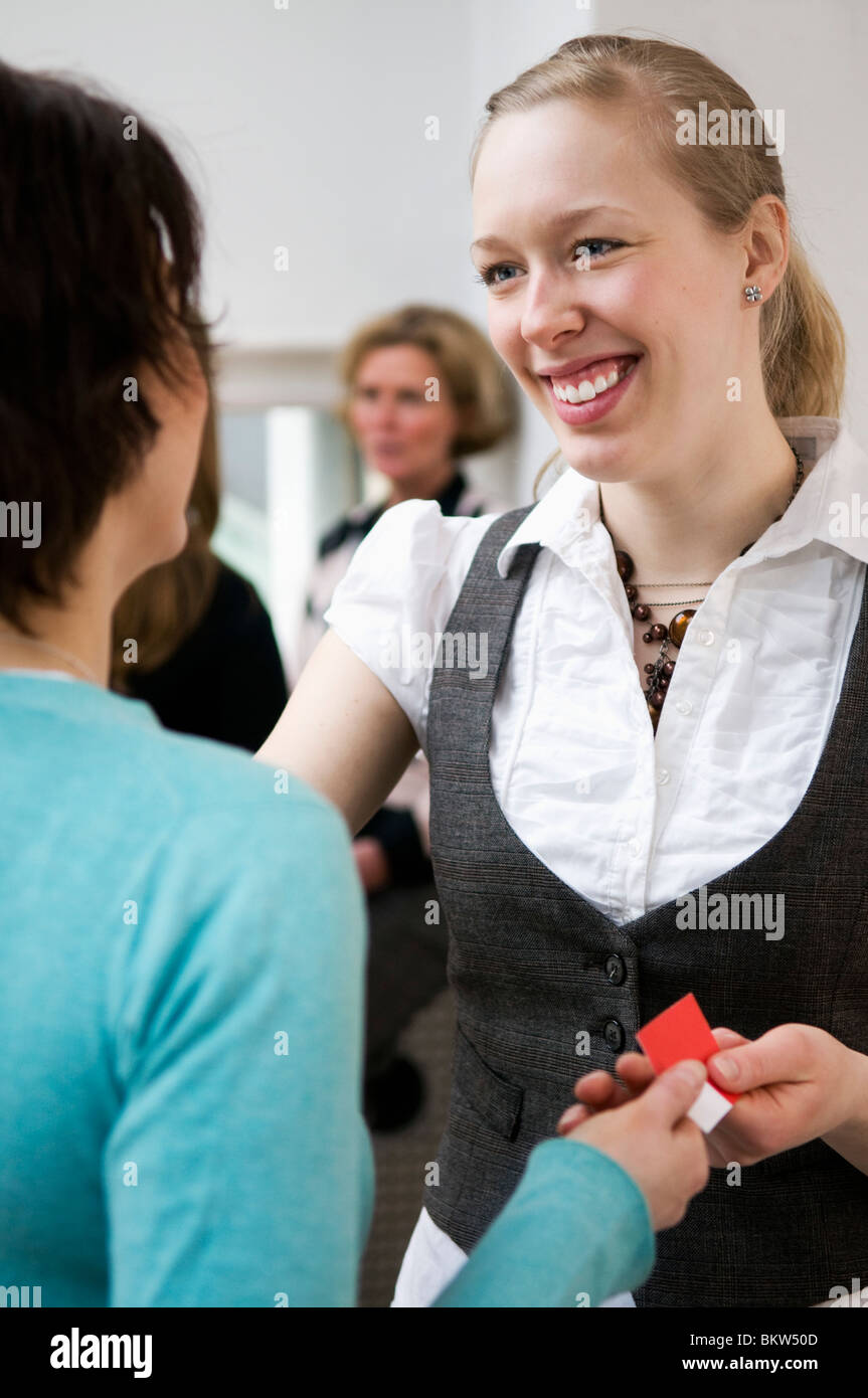Women mingle at work Stock Photo - Alamy