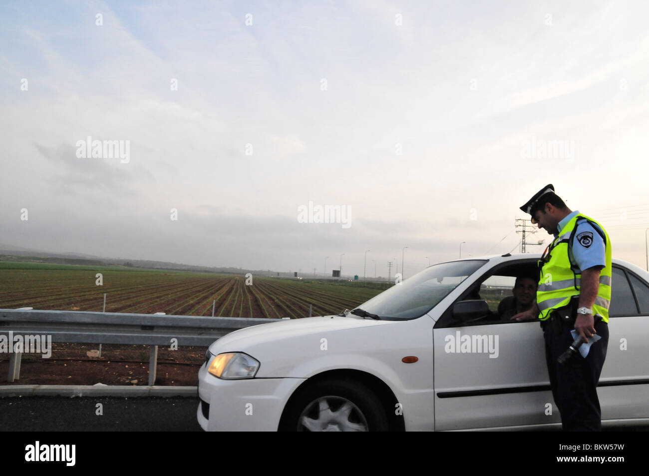 Israel, Traffic Cop stops a car for inspection Stock Photo - Alamy