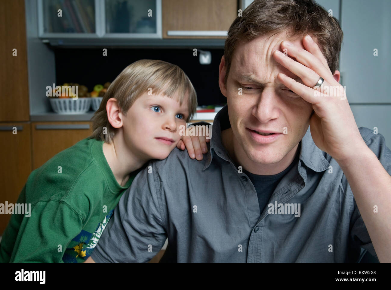 Child with sick dad Stock Photo - Alamy
