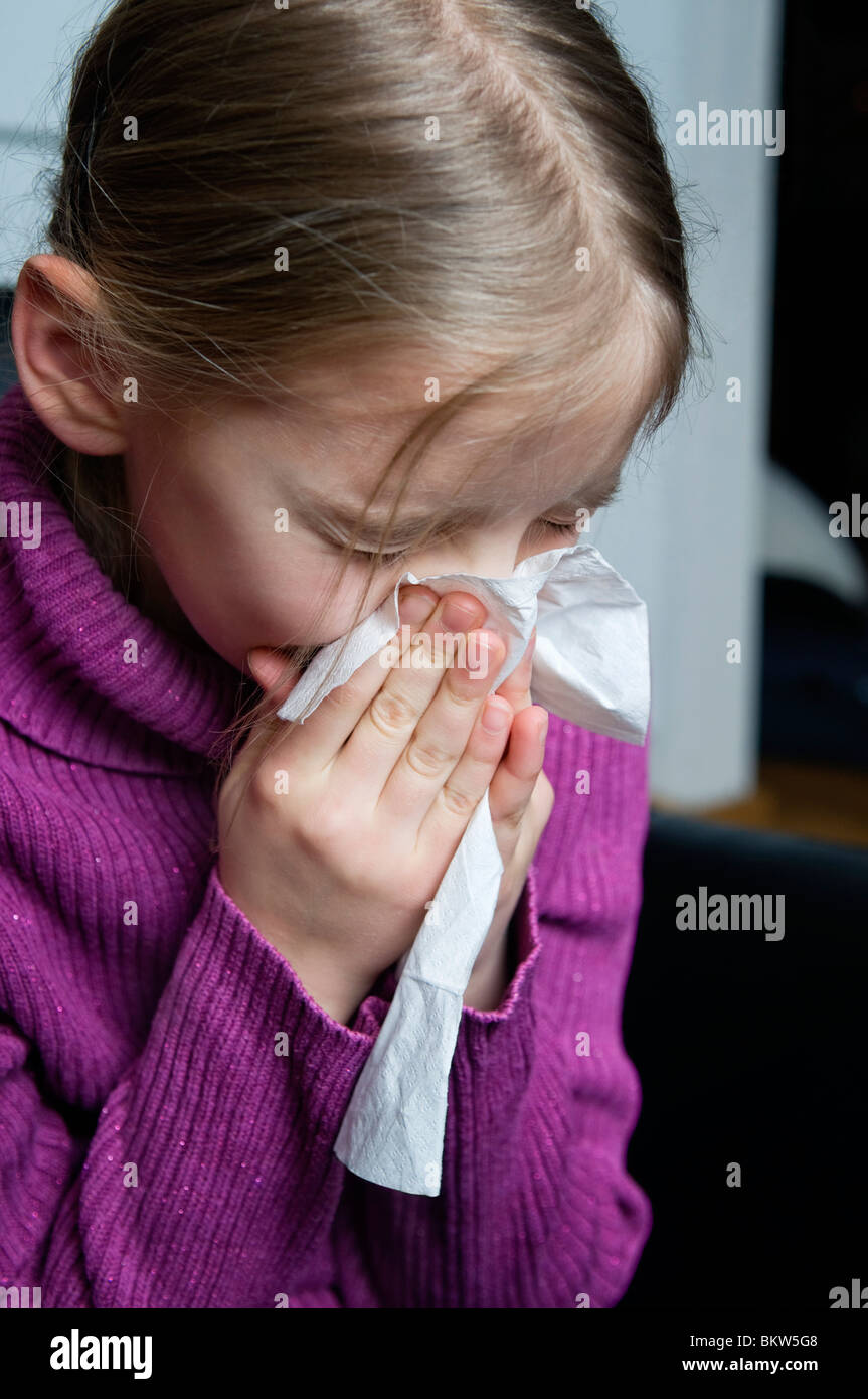 Girls blowing her nose hi-res stock photography and images - Alamy