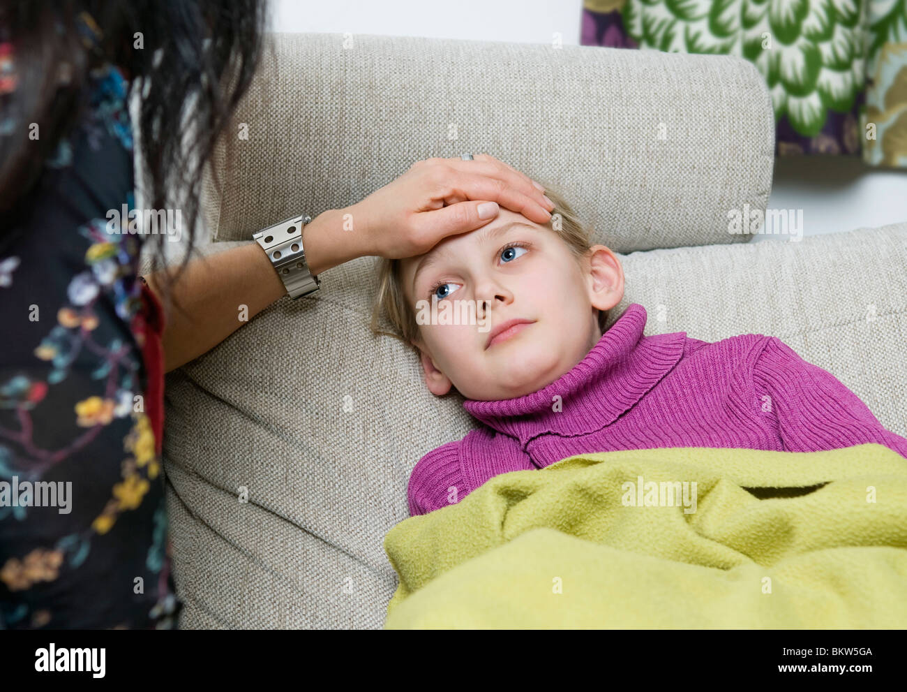 Taking care of sick child Stock Photo - Alamy