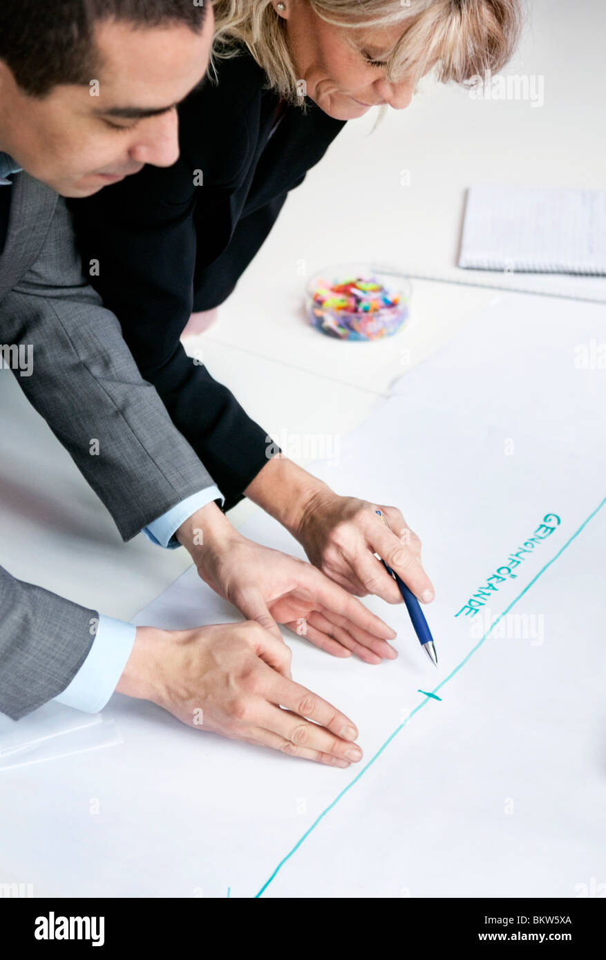 Colleagues debating hi-res stock photography and images - Alamy