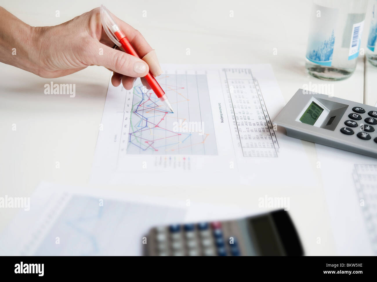 Person checking diagram Stock Photo - Alamy