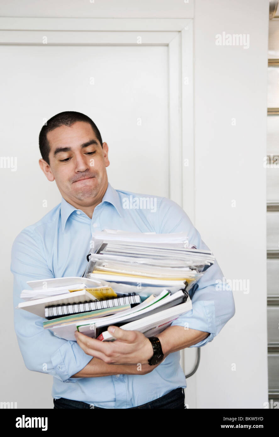 Man balancing books Stock Photo - Alamy Man balancing books Stock Photo - Alamy