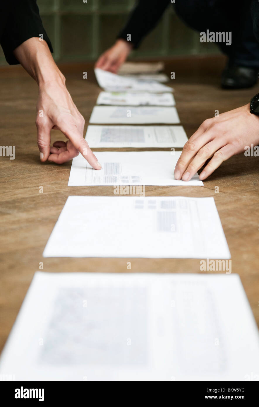 Documents on floor Stock Photo - Alamy