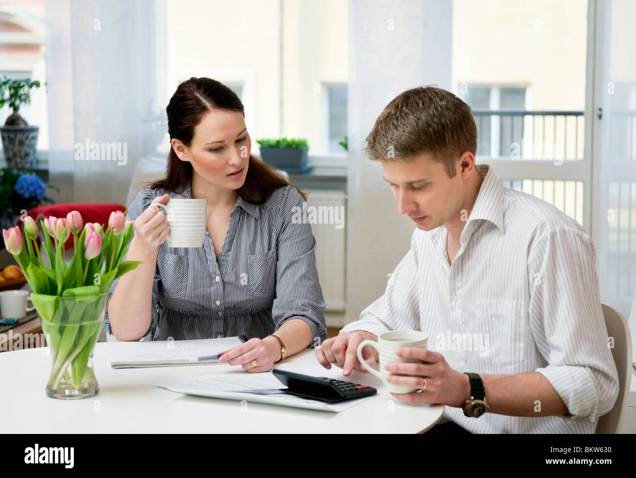 Couple having coffee Stock Photo - Alamy