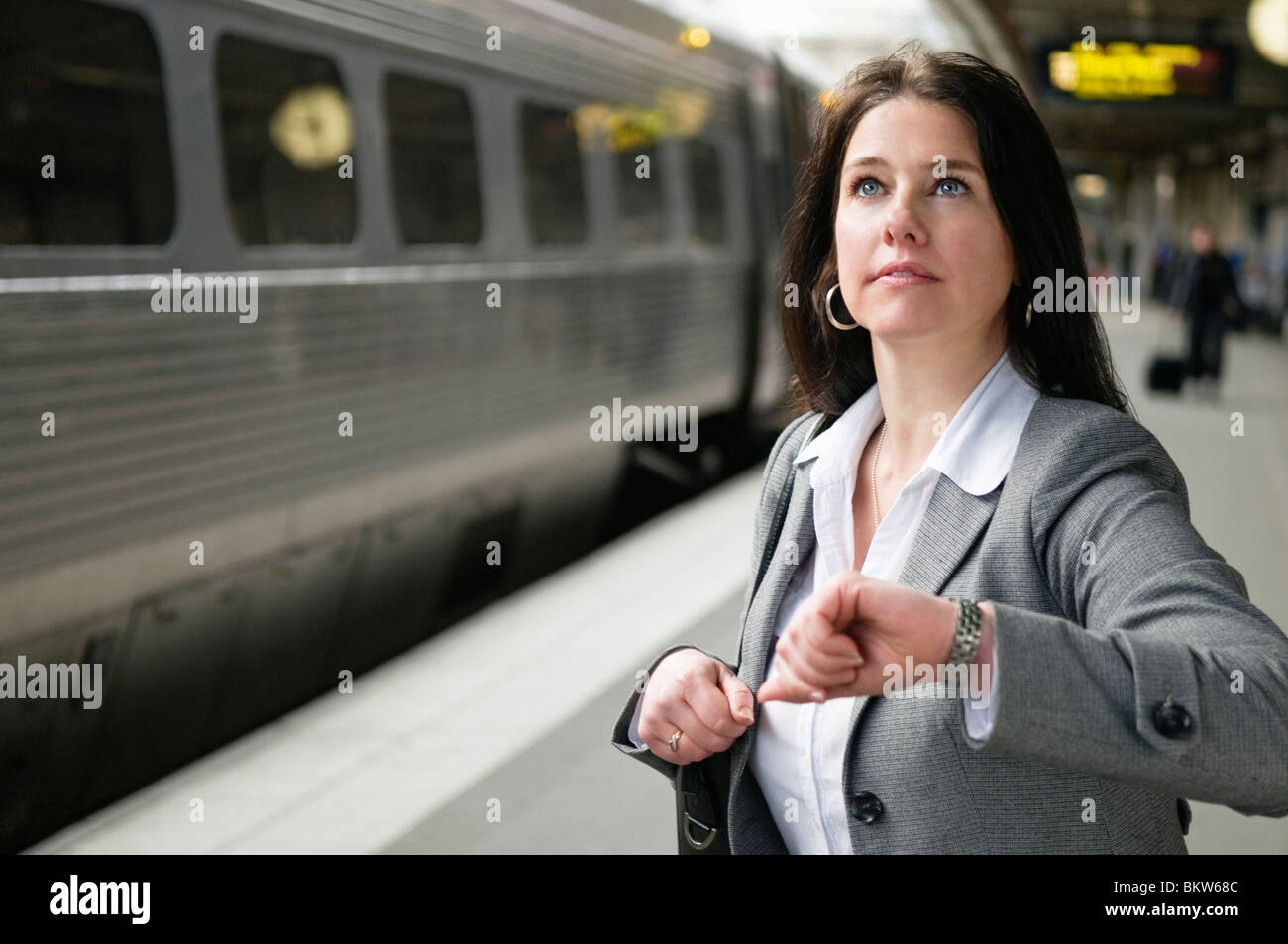 Checking watch and platform hi-res stock photography and images - Alamy