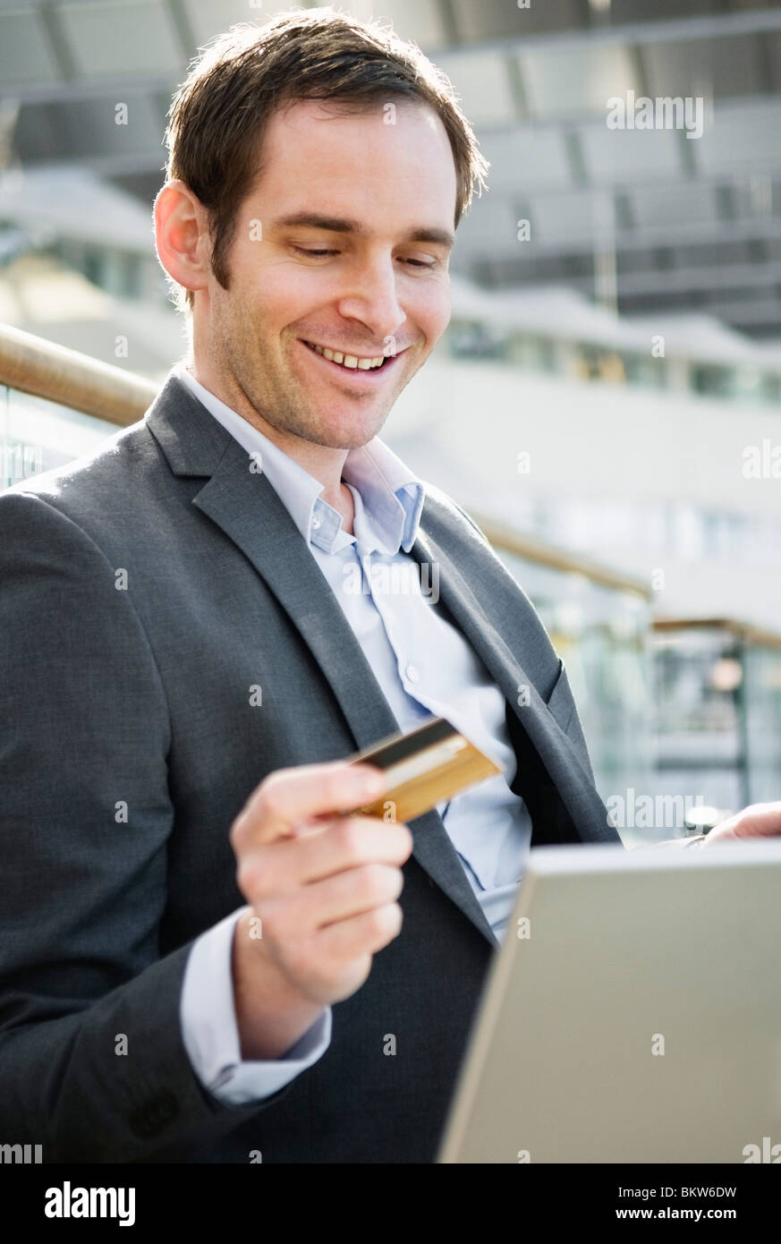 Man with credit card Stock Photo - Alamy