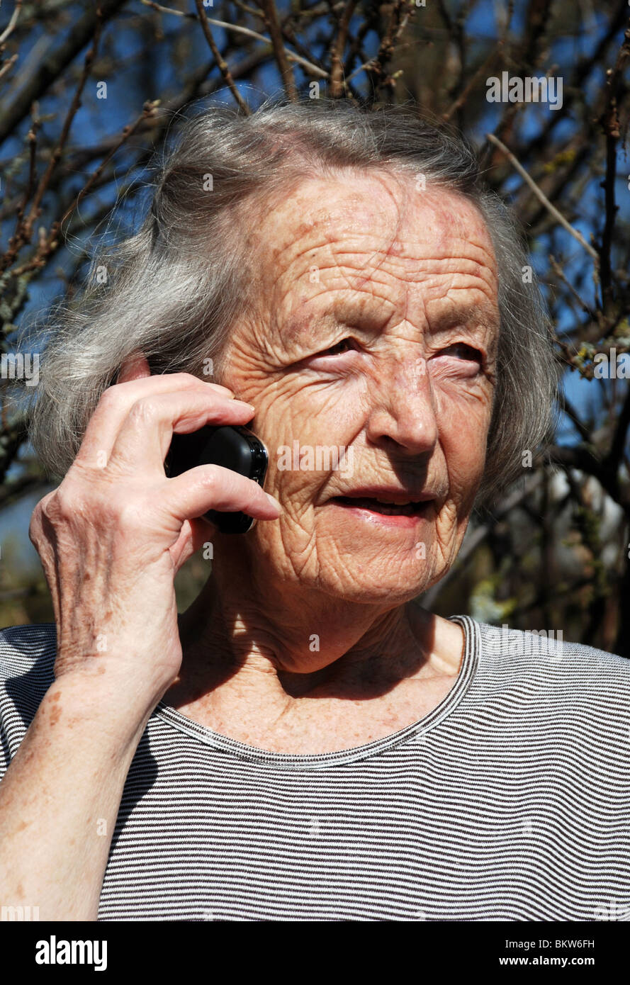 Older Person Talking Phone High Resolution Stock Photography and Images ...