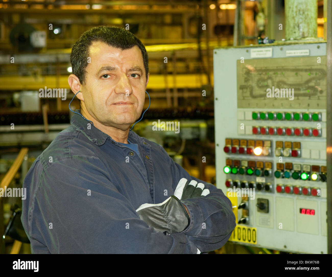 Man running control panel Stock Photo - Alamy