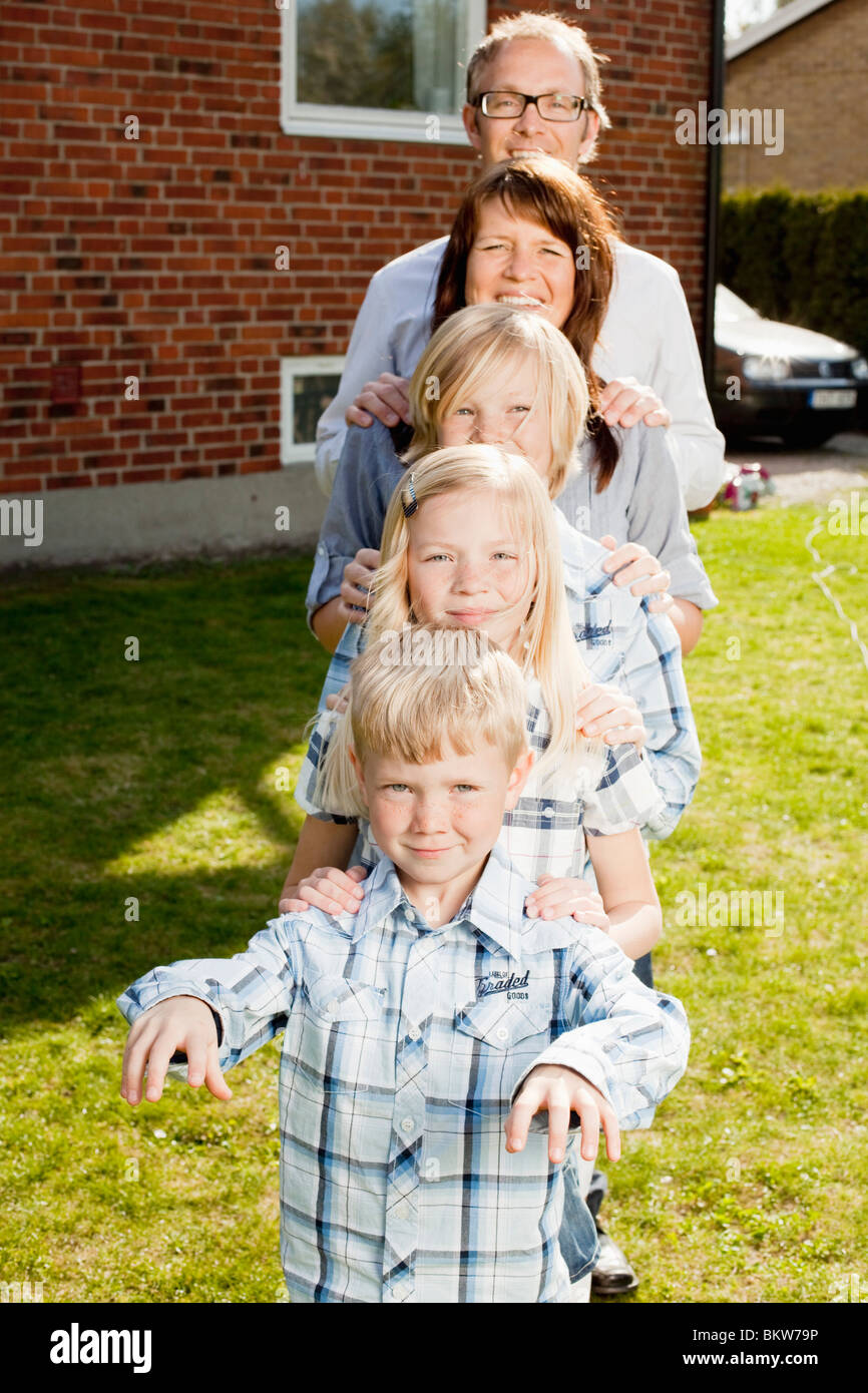 Family family line up hi-res stock photography and images - Alamy