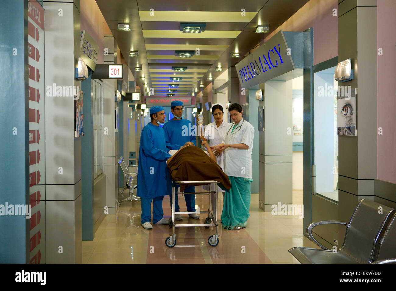 Doctor doing a quick examination to a patient Stock Photo - Alamy