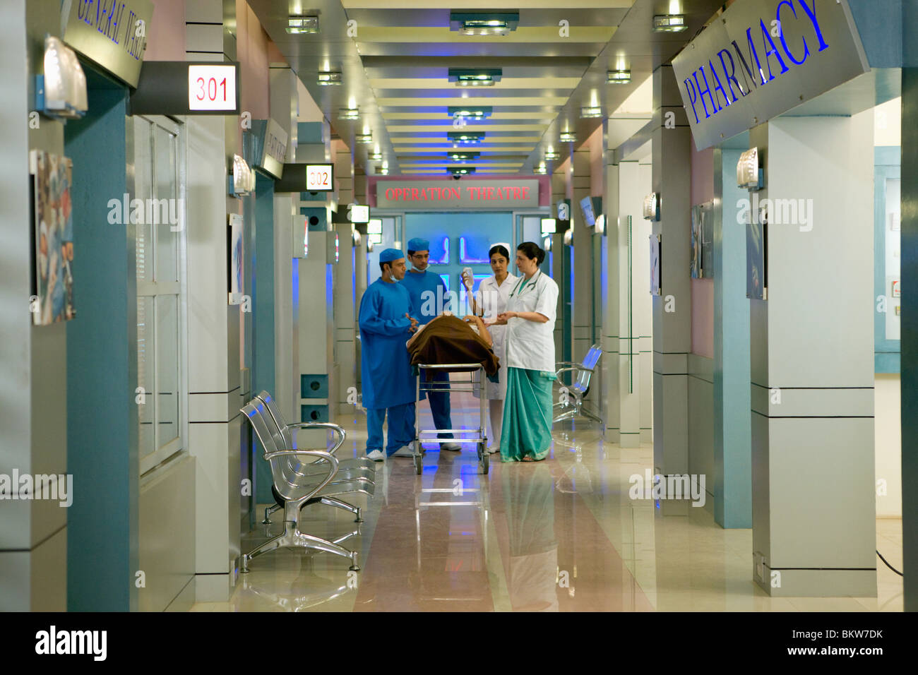 Doctor doing a quick examination to a patient Stock Photo - Alamy