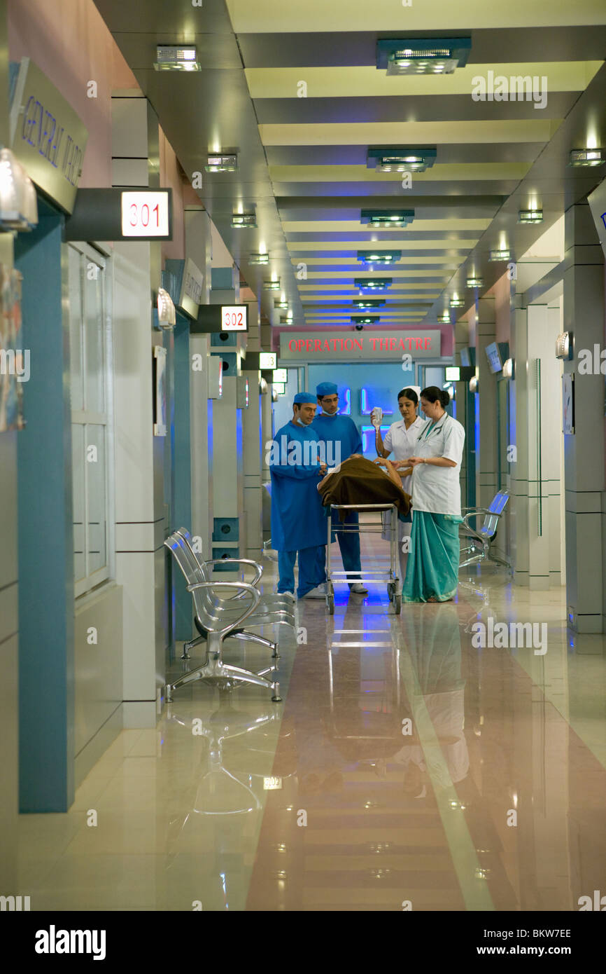 Doctor doing a quick examination to a patient Stock Photo - Alamy
