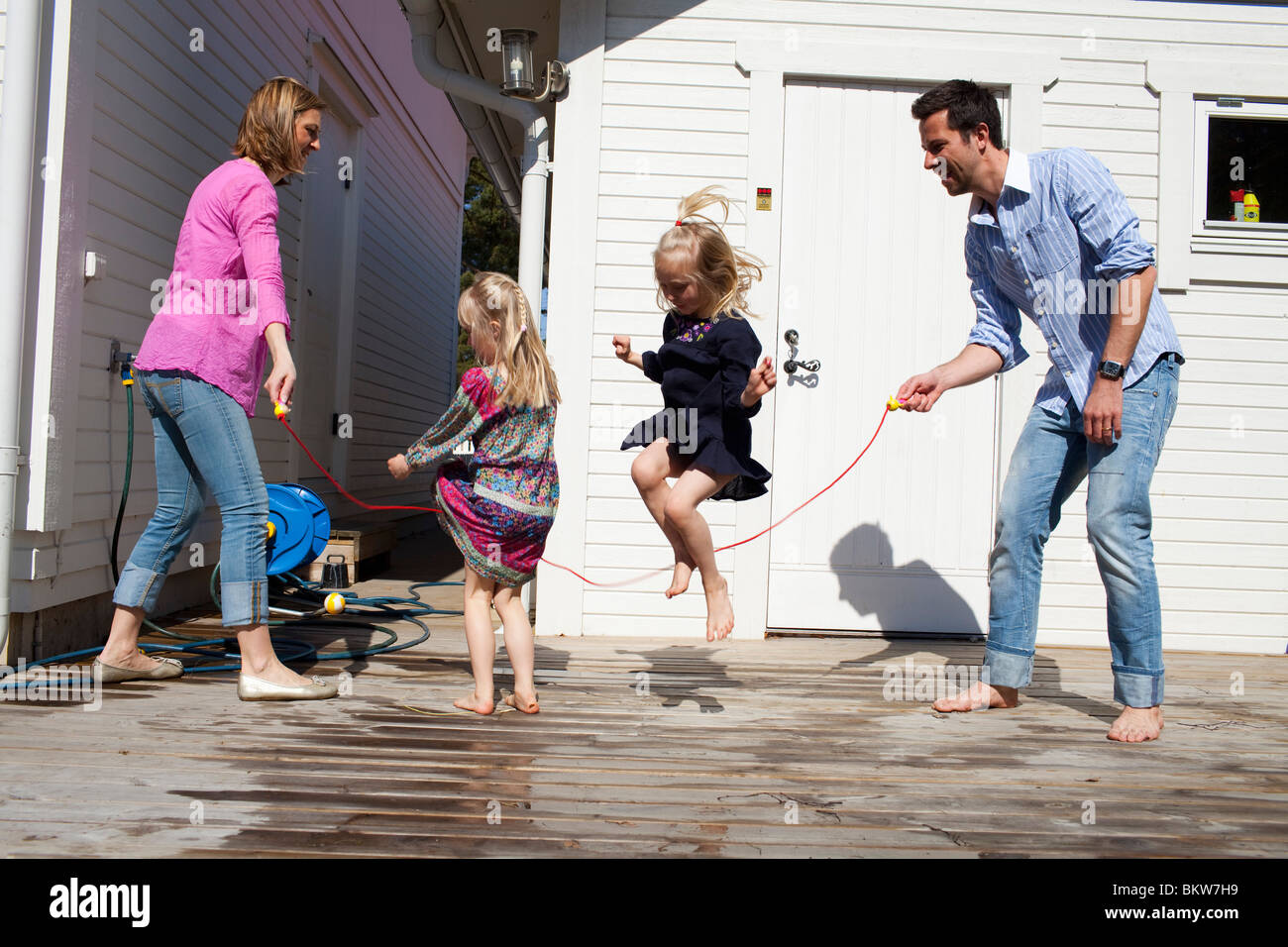 Mother And Daughter Jumping Rope High Resolution Stock Photography and ...