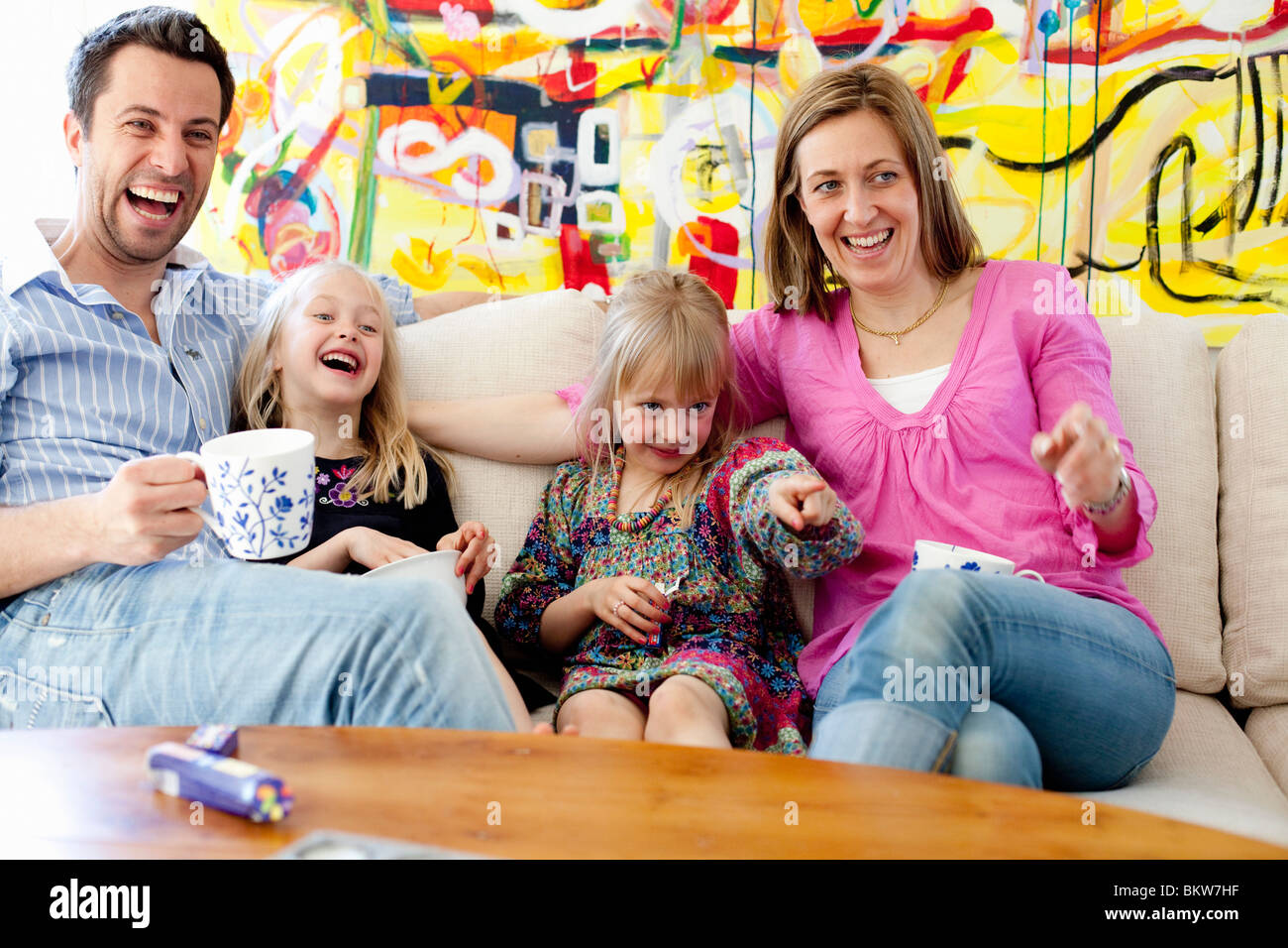 Laughing mother and daughter sweaters hi-res stock photography and ...