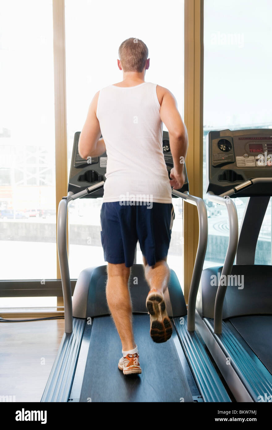 Running machine rear view hi-res stock photography and images - Alamy