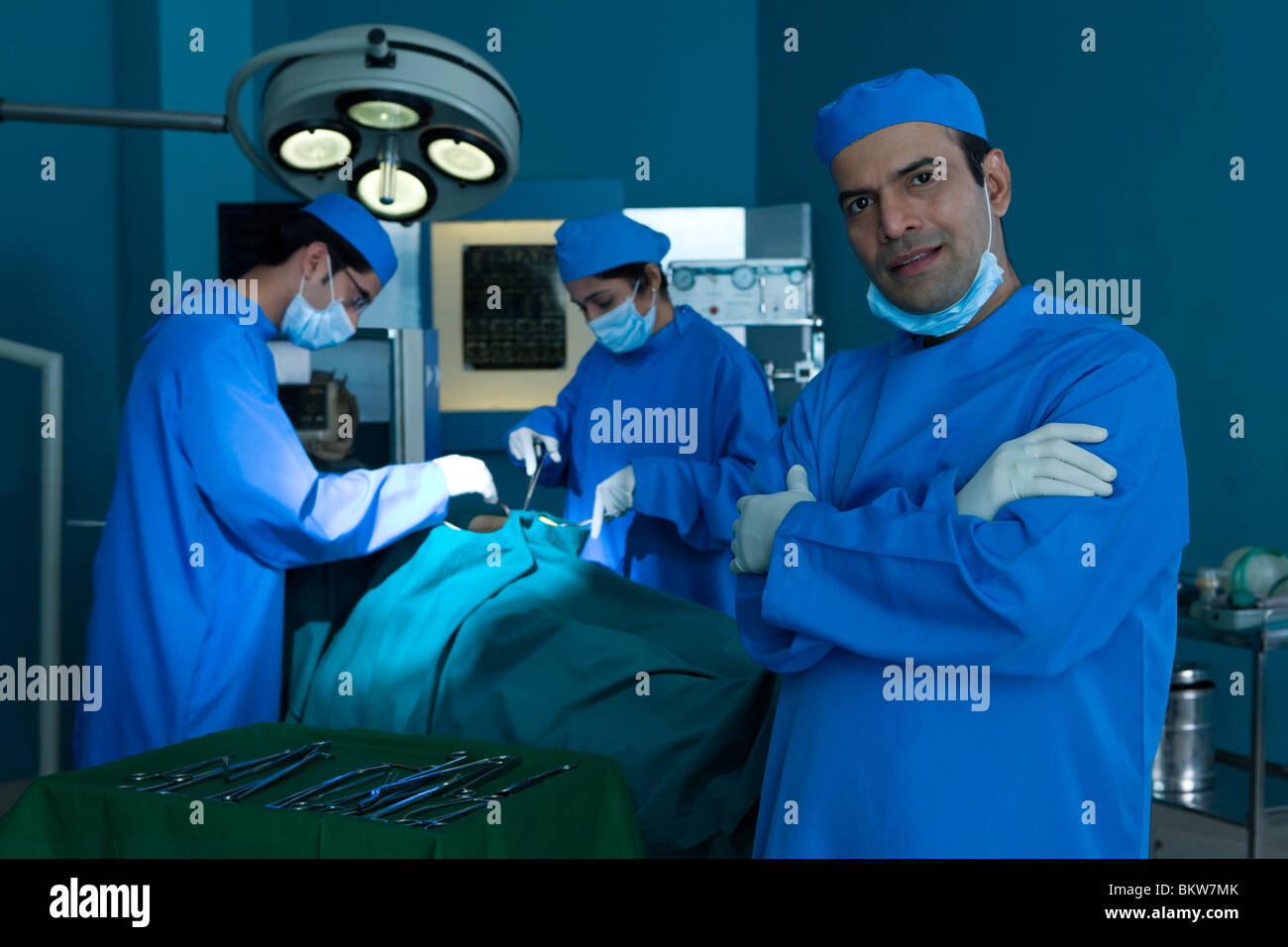 Confident male surgeon in the operating room Stock Photo - Alamy