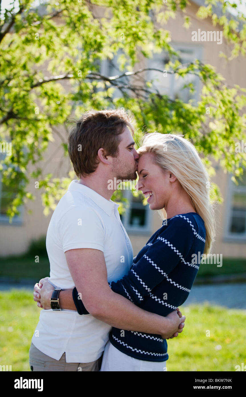 Love Couple Under Tree High Resolution Stock Photography and Images - Alamy