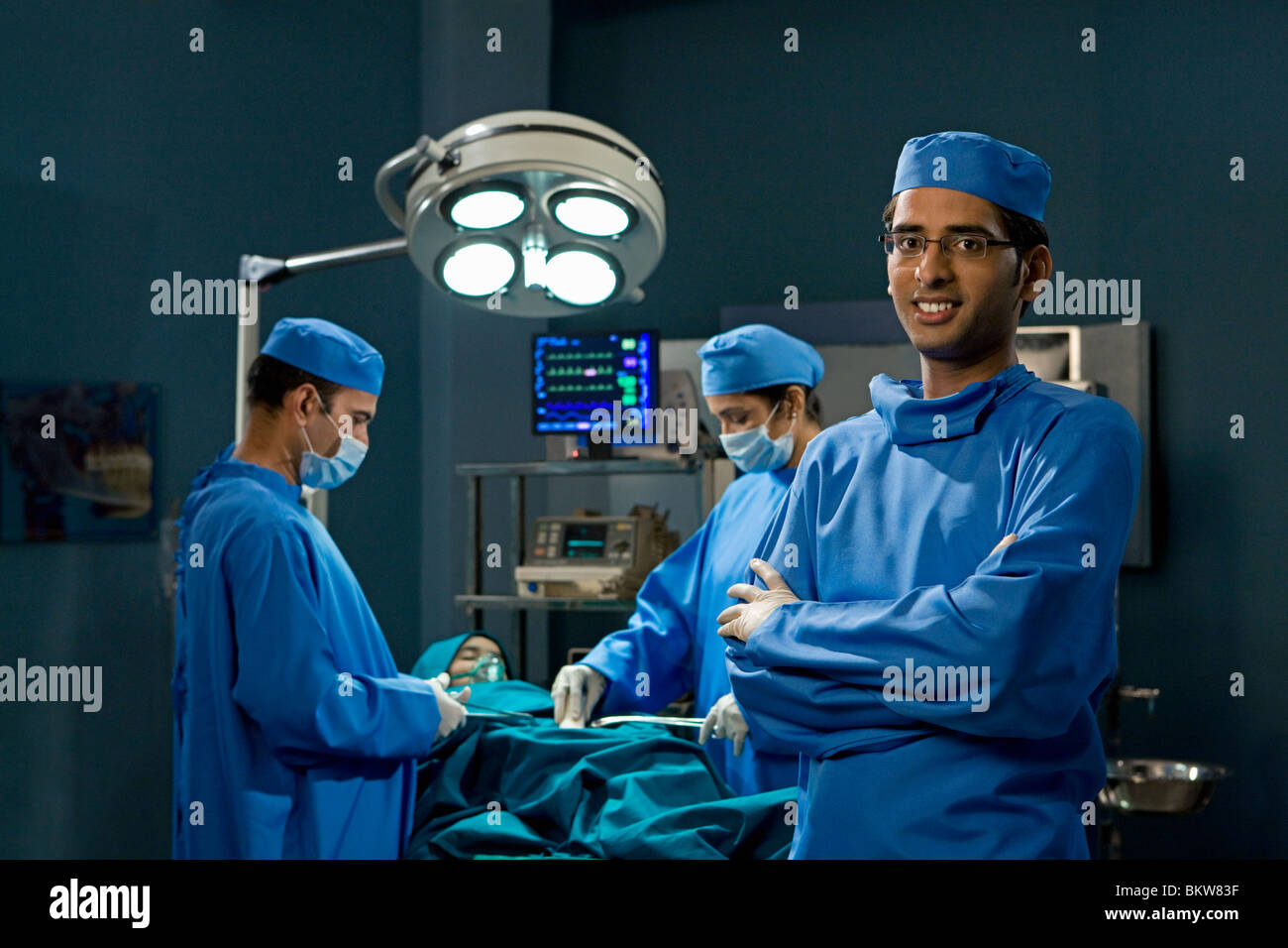 Confident male surgeon in the operating room Stock Photo - Alamy