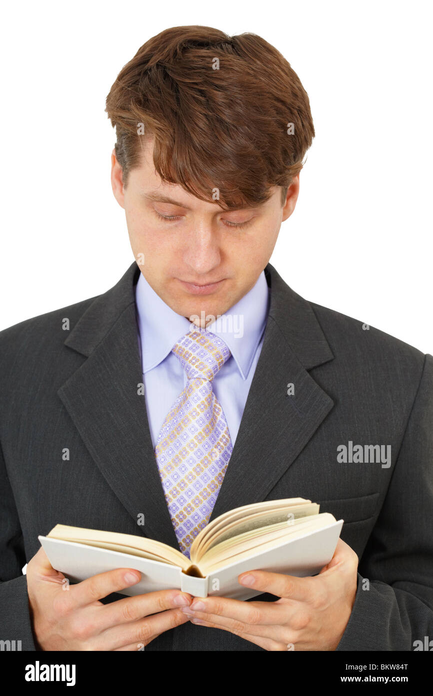 The young man reading a book, isolated on a white background Stock ...