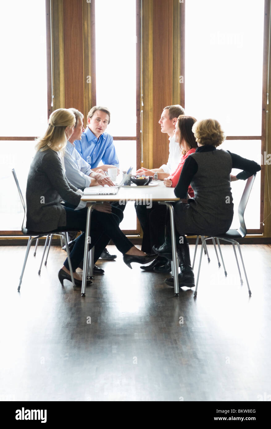 Six businessmen sitting together hi-res stock photography and images ...